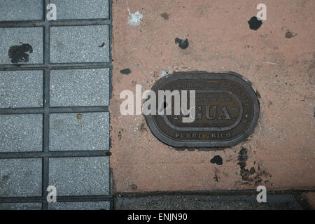 Water meter cover in ground Stock Photo - Alamy
