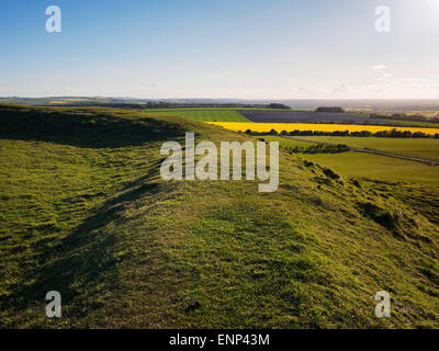 The earth ramparts of the iron age hill fort Uffington Castle on White ...