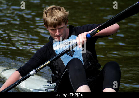 Young man competing in a K1 racing kayak Stock Photo - Alamy
