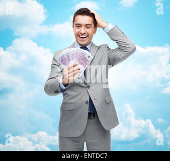 happy laughing businessman with euro money Stock Photo - Alamy