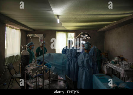 Doctors operating in a military hospital during the battles for ...
