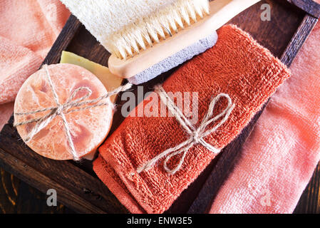 clear towels and aroma soap in the wooden box Stock Photo - Alamy