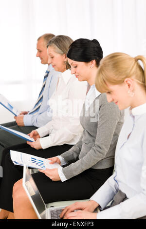 Interview business people waiting study report Stock Photo - Alamy