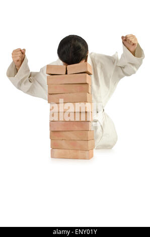 Karate man breaking bricks on white Stock Photo - Alamy