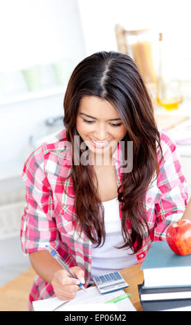 Young female student in math class overwhelmed by the math formula ...
