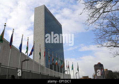 The United Nations Headquarters Secretariat Building and international flags. Exterior. Nobody ...