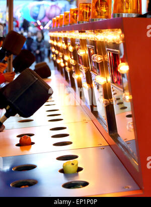 A whacking game at carnival Stock Photo - Alamy