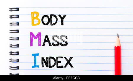 BMI as Body Mass Index Text written on notebook page, red pencil on the ...