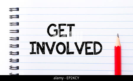 Get Involved Text written on notebook page, red pencil on the right ...