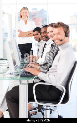 Beautiful female manager leading her representative team Stock Photo ...