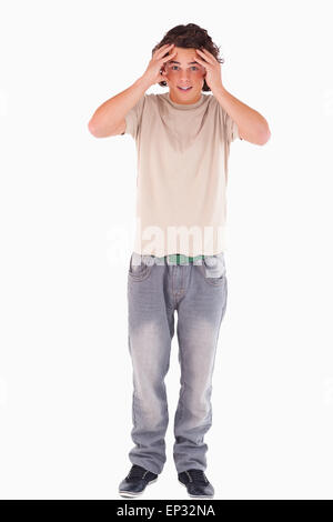 Embarressed brunette man Stock Photo - Alamy