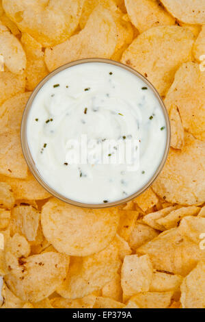 close up of potato crisps and nachos in bowls Stock Photo - Alamy