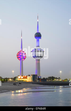 Kuwait Towers illuminated at night in Kuwait City, Kuwait Stock Photo ...