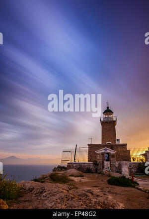 Lighthouse against cloudy sky at dusk, elevated view Stock Photo - Alamy