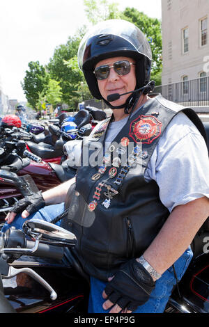 elderly man sitting on a motorcycle Stock Photo - Alamy