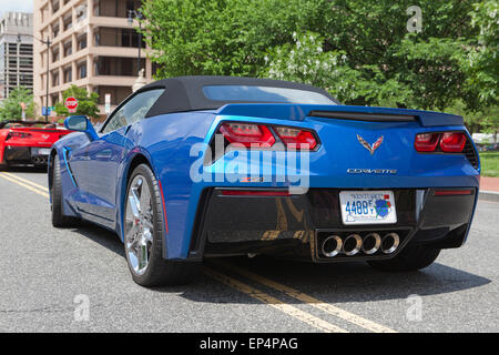 Rear view of a blue Chevrolet Corvette C3 Stingray car parked at a ...