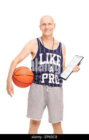 Senior man with coach looking at clipboard Stock Photo - Alamy