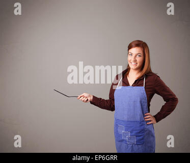 Pretty cook woman with black uniform isolated on white background Stock ...