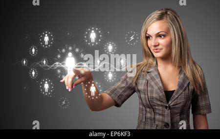 Hand pressing social media multimedia application screen with media ...