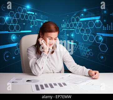 Businesswoman doing paperwork with futuristic background Stock Photo ...