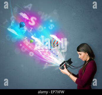 Photographer with camera and abstract imaginary Stock Photo - Alamy