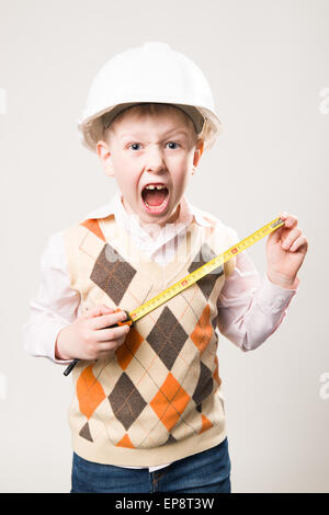 Boy with tape measure Stock Photo - Alamy