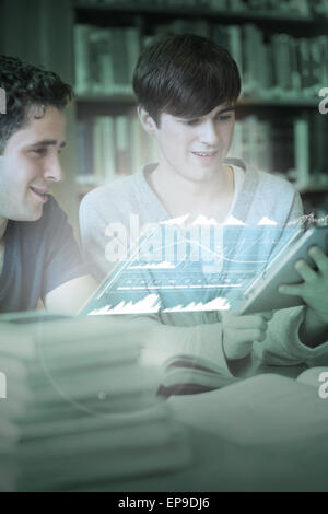 Content students working together on their digital tablet Stock Photo ...