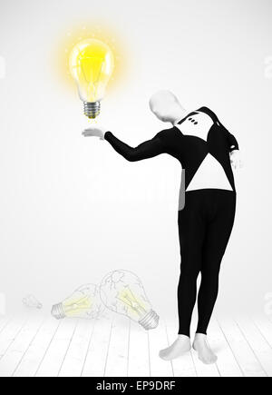 Man in full body with glowing light bulb Stock Photo - Alamy