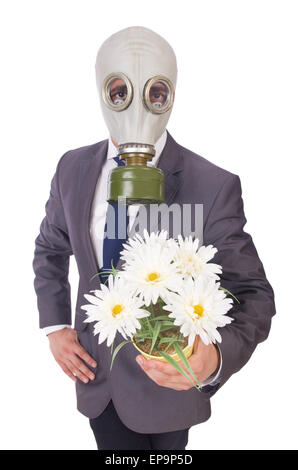 White flowers with a gas mask on black background - the concept of ...