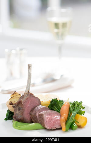 Duo of Lamb served with seasonal vegetables Stock Photo - Alamy