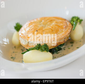 Wild Mushroom Pithivier with butttered spinach and tarragon cream sauce ...