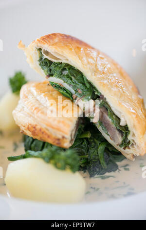 Wild Mushroom Pithivier with butttered spinach and tarragon cream sauce ...