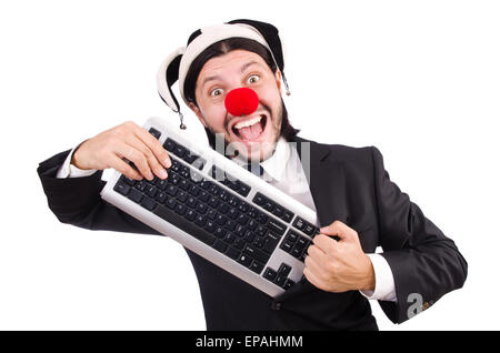 Funny clown with keyboard isolated on white Stock Photo - Alamy