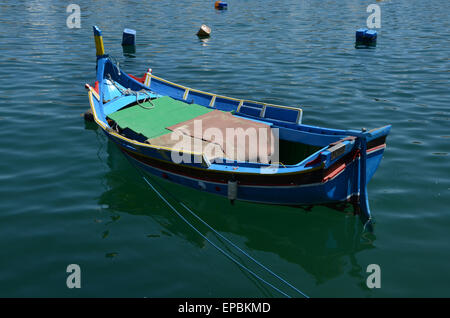 Traditional Maltese luzzu in Marsascala harbour Stock Photo - Alamy