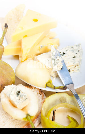 selection of different cheese and fresh pears appetizer snack Stock ...