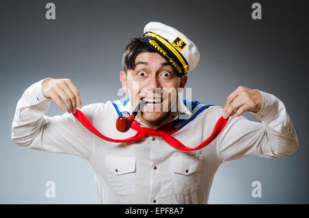 Funny captain sailor wearing hat. Seaman fun Stock Photo - Alamy