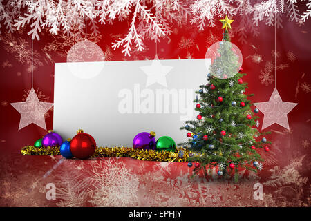 Composite image of poster with christmas tree Stock Photo - Alamy