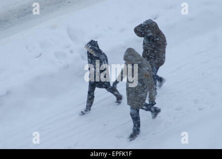 People seen walking in heavy snowfall. On the first day of the new year ...