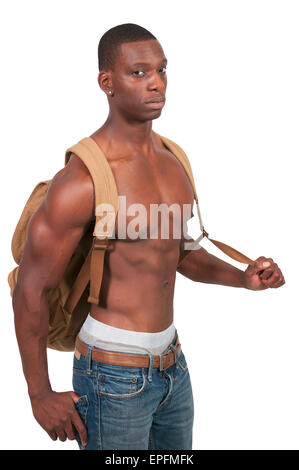 african american man student with backpack in studio smiling at the ...