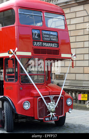 Just Married on a Red Bus Stock Photo - Alamy