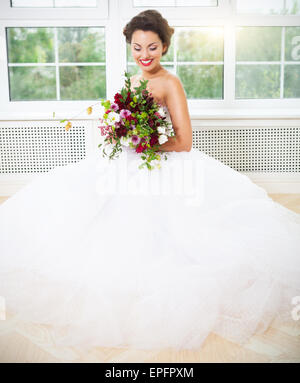 Bride holding unusual wedding bouquet with succulent flowers and hop in ...