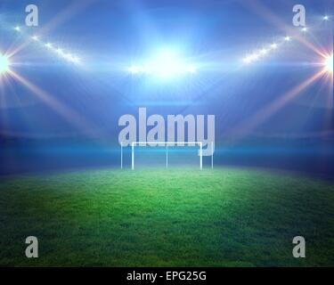 Football pitch with lights and goalpost Stock Photo - Alamy