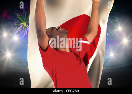 Composite image of excited handsome football fan cheering Stock Photo ...