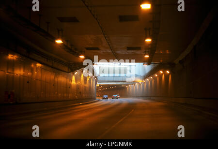 Multi lane highway car tunnel entrance Stock Photo - Alamy