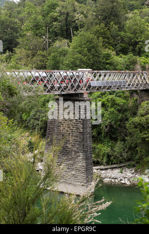 The iron bridge single lane crossing over the Buller River, New Zealand ...