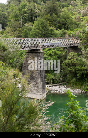 Single lane road bridge over the Orange River below the overflowing ...