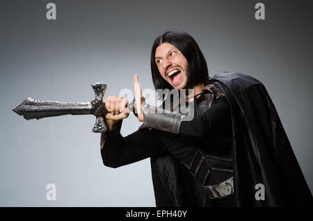 Angry medieval knight armor with a sword, black and white image Stock ...