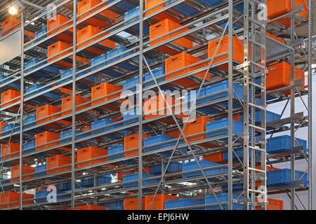 Warehouse Shelving System With Plastic Crates and Boxes Stock Photo - Alamy
