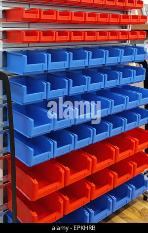 Sorting bins shelf Stock Photo - Alamy
