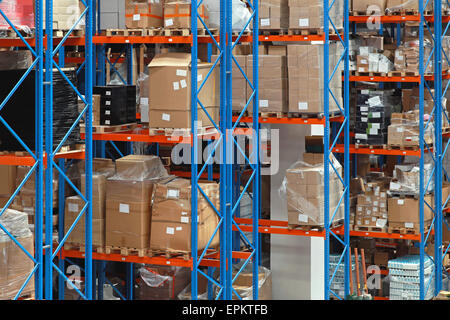 Distribution centre with high rack shelving system Stock Photo - Alamy